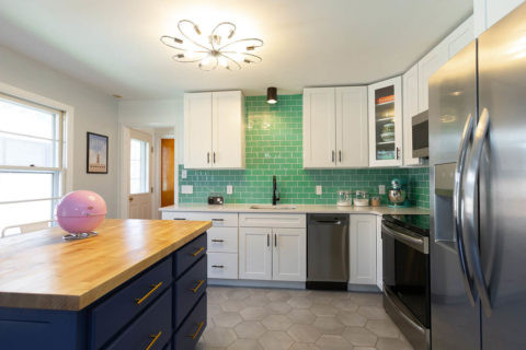 A splash of color in this white kitchen - Capitol Kitchens and Baths